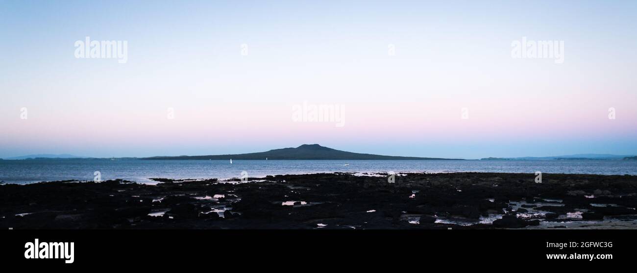 Rangitoto Island at sunset. Photo taken at Takapuna Beach, Auckland ...