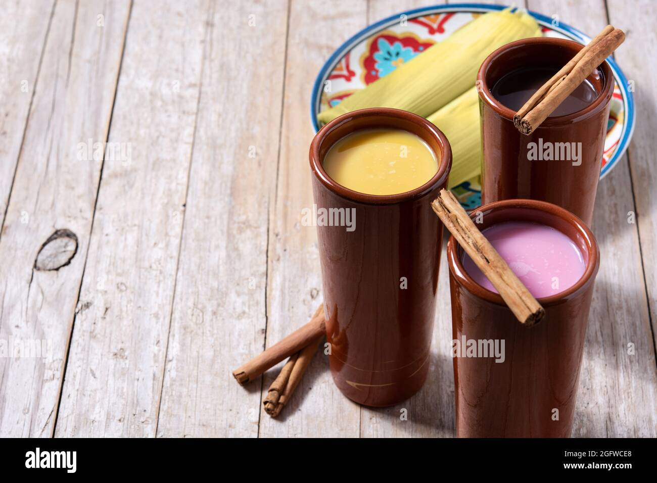 Traditional Mexican atole drink on rustic wooden table Stock Photo - Alamy