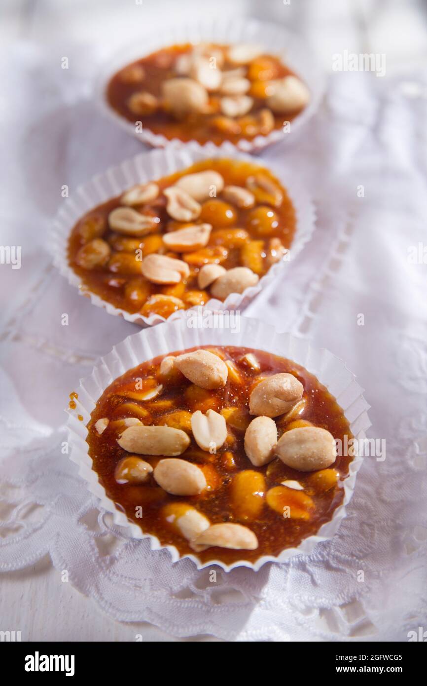 Crunchy sweet made of sugar and dried fruit Stock Photo - Alamy