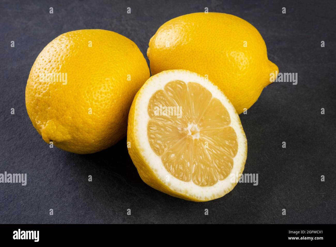 Sicilian lemons on slate stone Stock Photo - Alamy