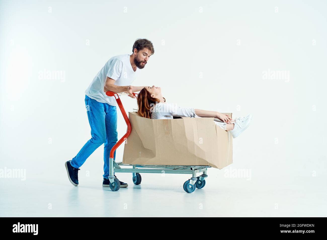 man next to woman shopping friendship light background Stock Photo - Alamy