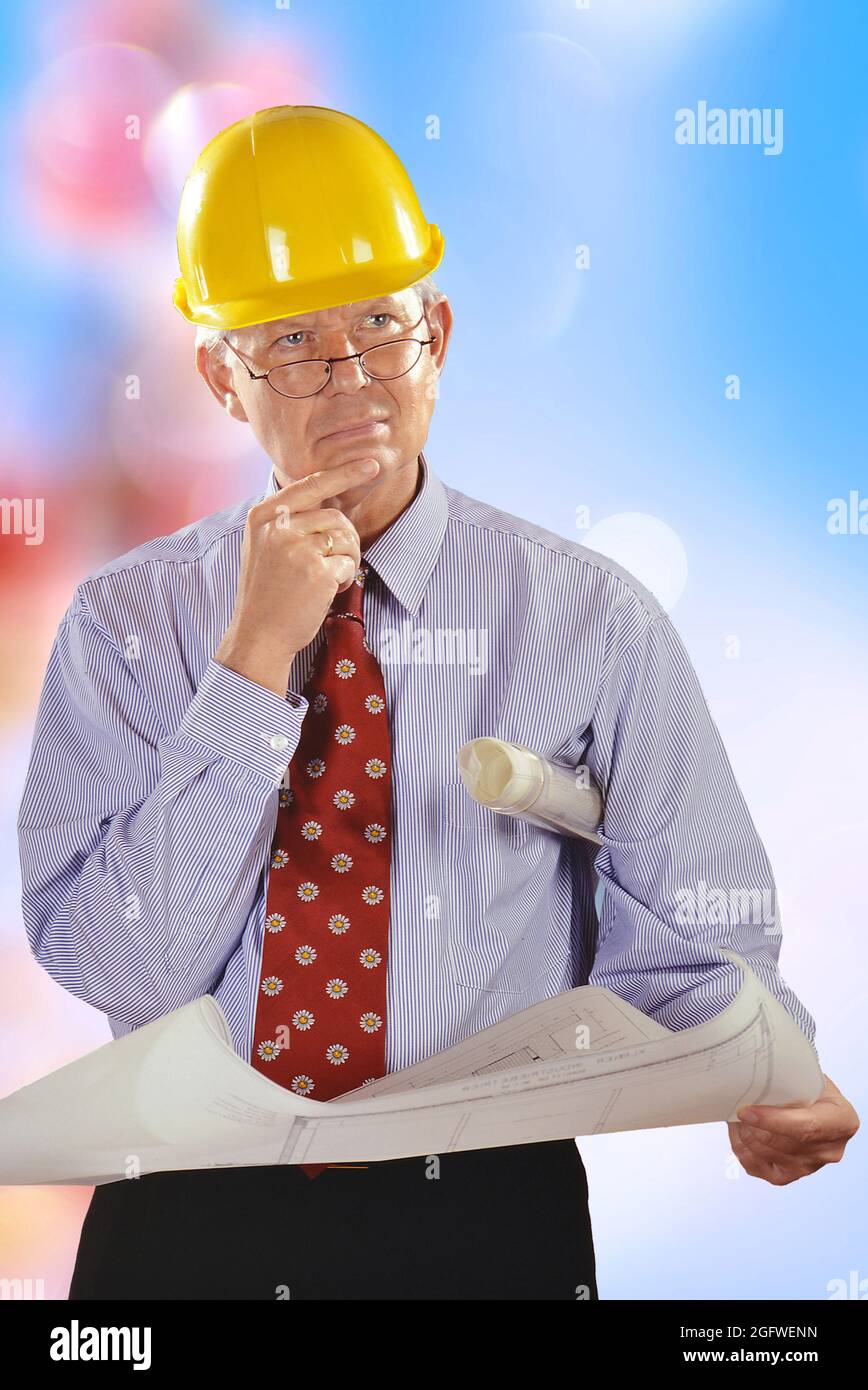 architect with construction plan and hard hat, blurred background Stock ...