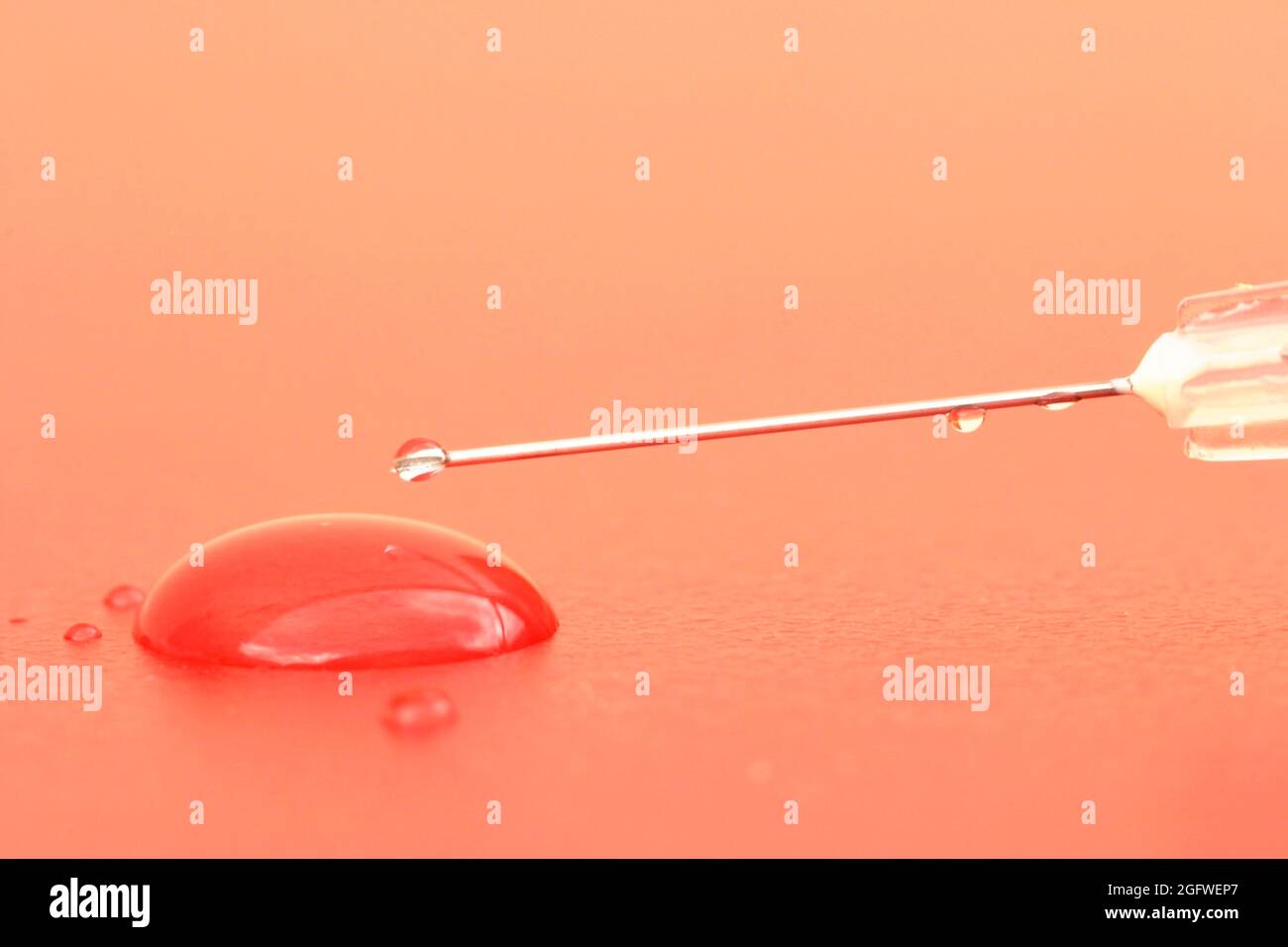 drop out of a syringe Stock Photo - Alamy