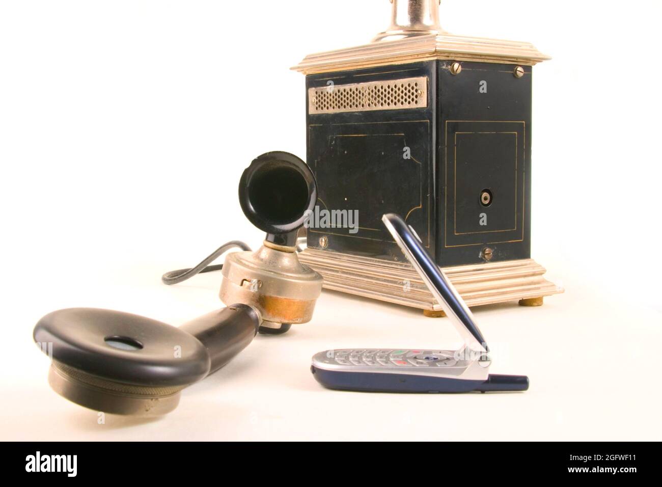 old telephone of the year 1900, with mobile Stock Photo - Alamy