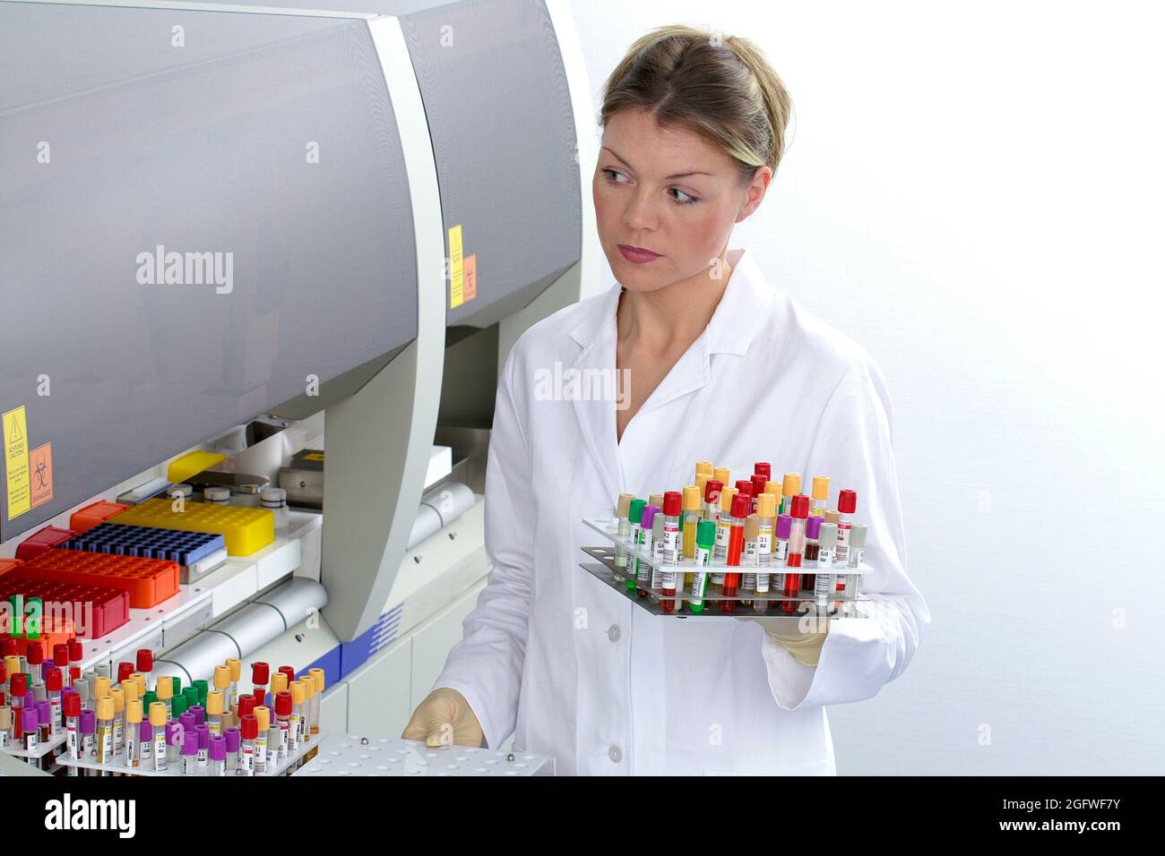 female laboratory assistant with blood samples in the laboratory Stock ...