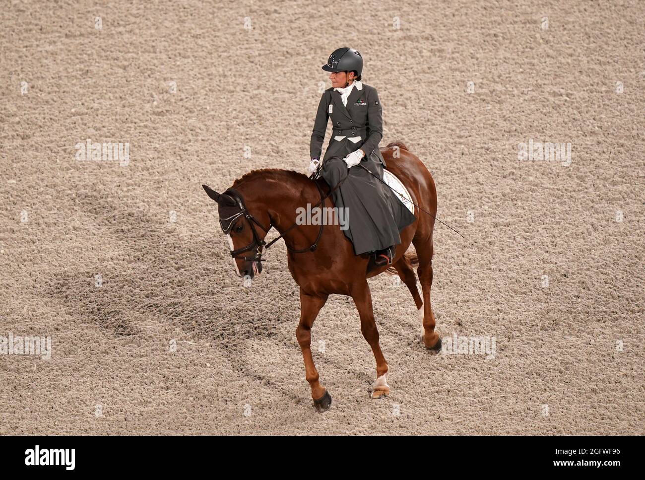 Belgium's Barbara Minneci riding Stuart competes in the Dressage ...
