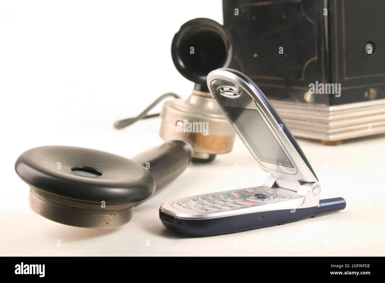 old telephone of the year 1900, with mobile Stock Photo - Alamy