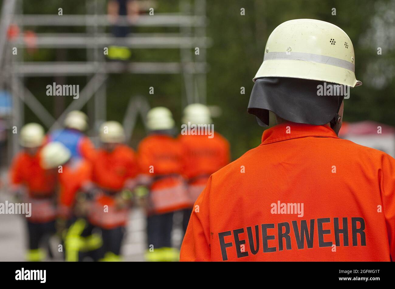 firefighter from behind, Germany Stock Photo - Alamy