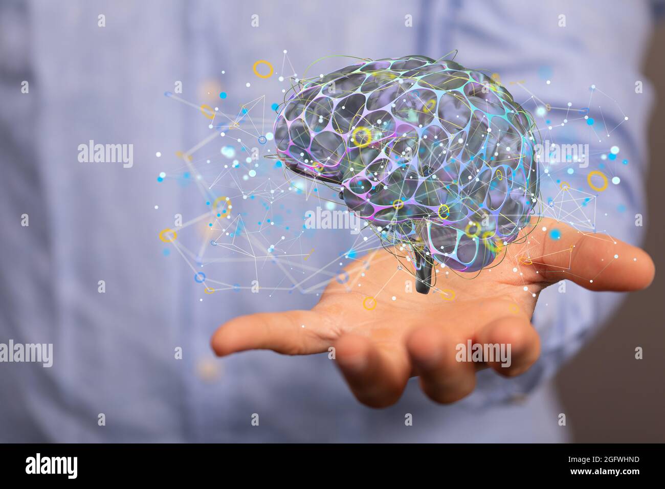 Hand holding an illustration of a human brain - the concept of ...