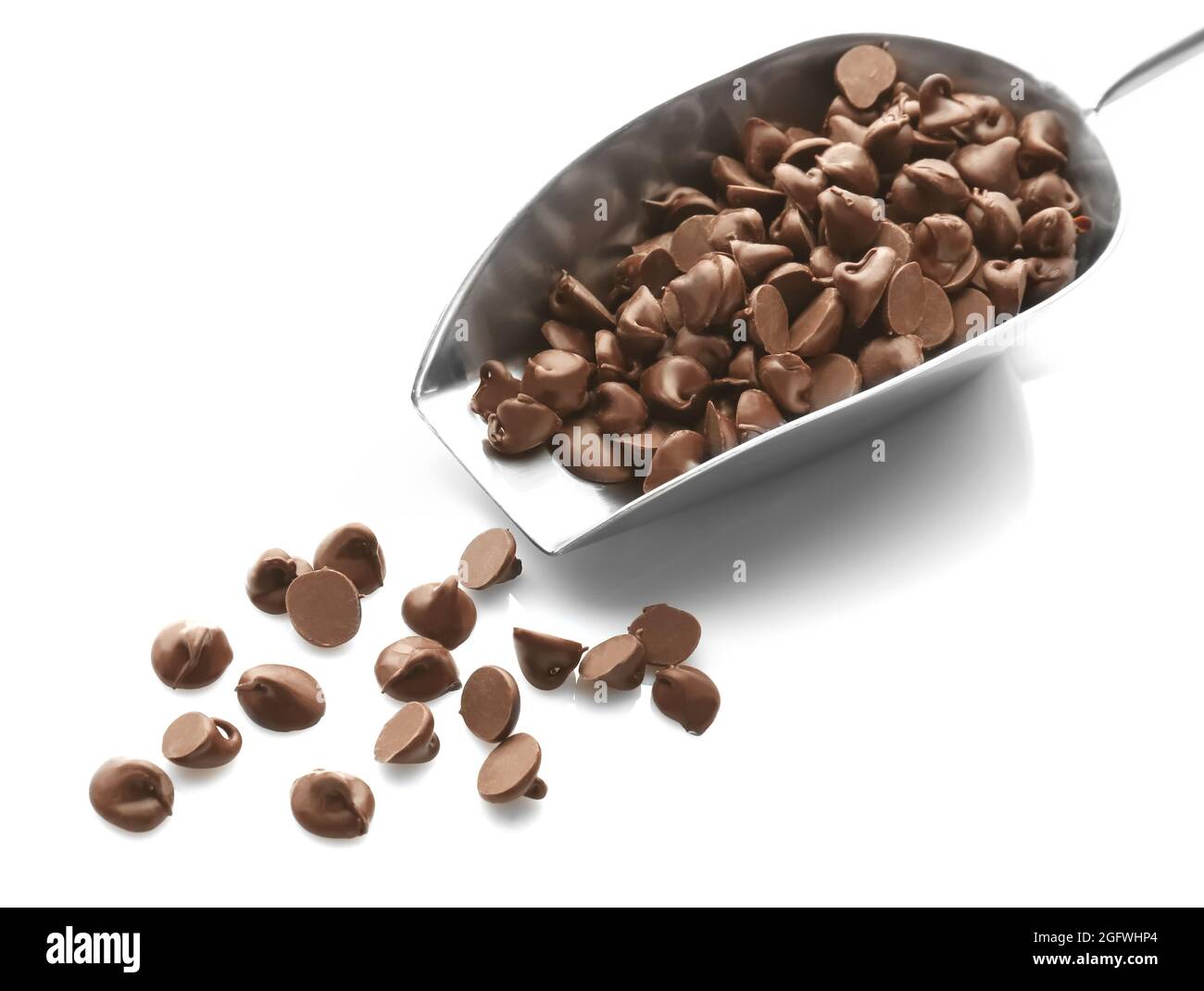 Metal scoop with tasty chocolate chips on white background Stock Photo ...