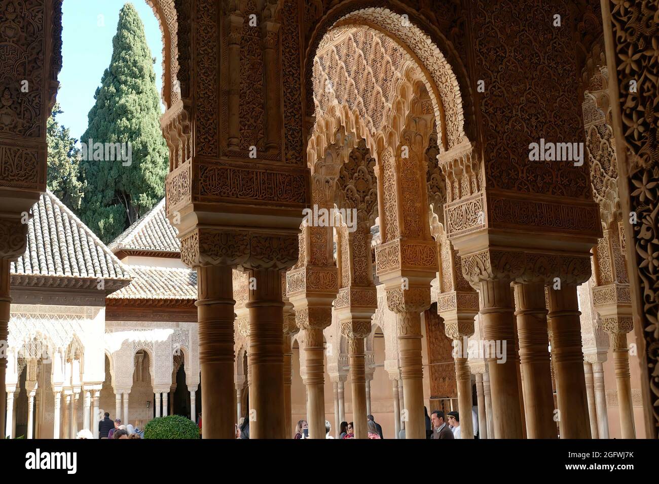 Shot of arc-shaped columns inside the Alhambra palace complex in ...