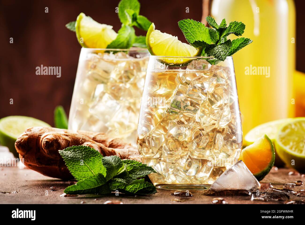 Classic Ginger Ale Cocktails with Beer, Lime, Lemon and Mint Leaves in ...