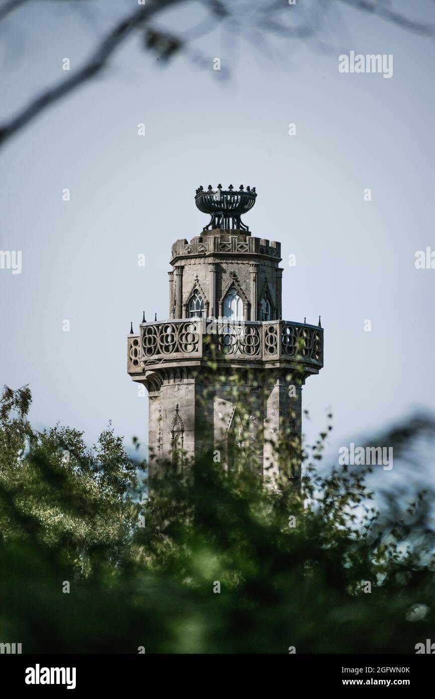 Monument through trees hi-res stock photography and images - Alamy