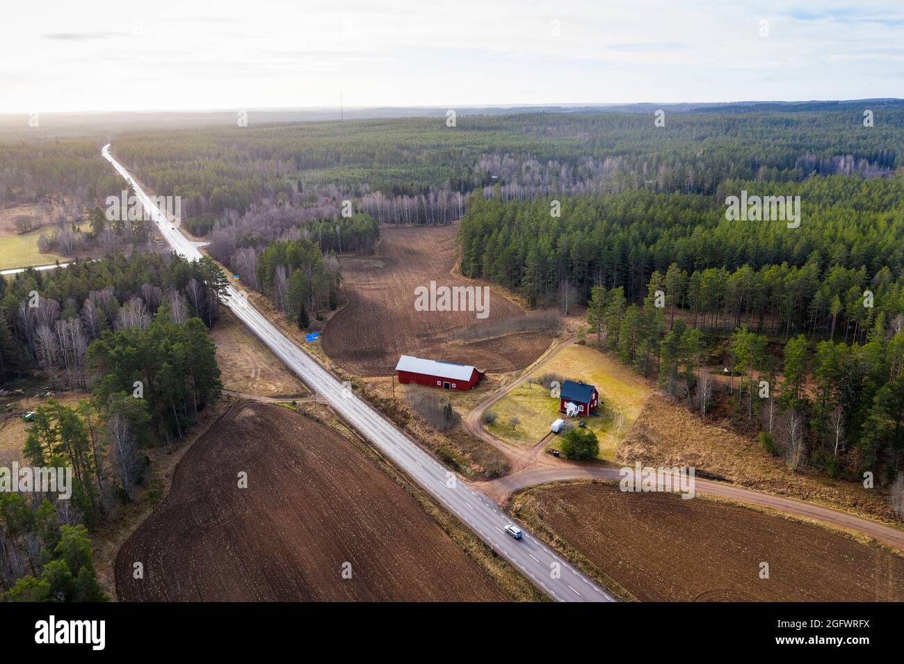 Aerial view of farm in forest Stock Photo - Alamy