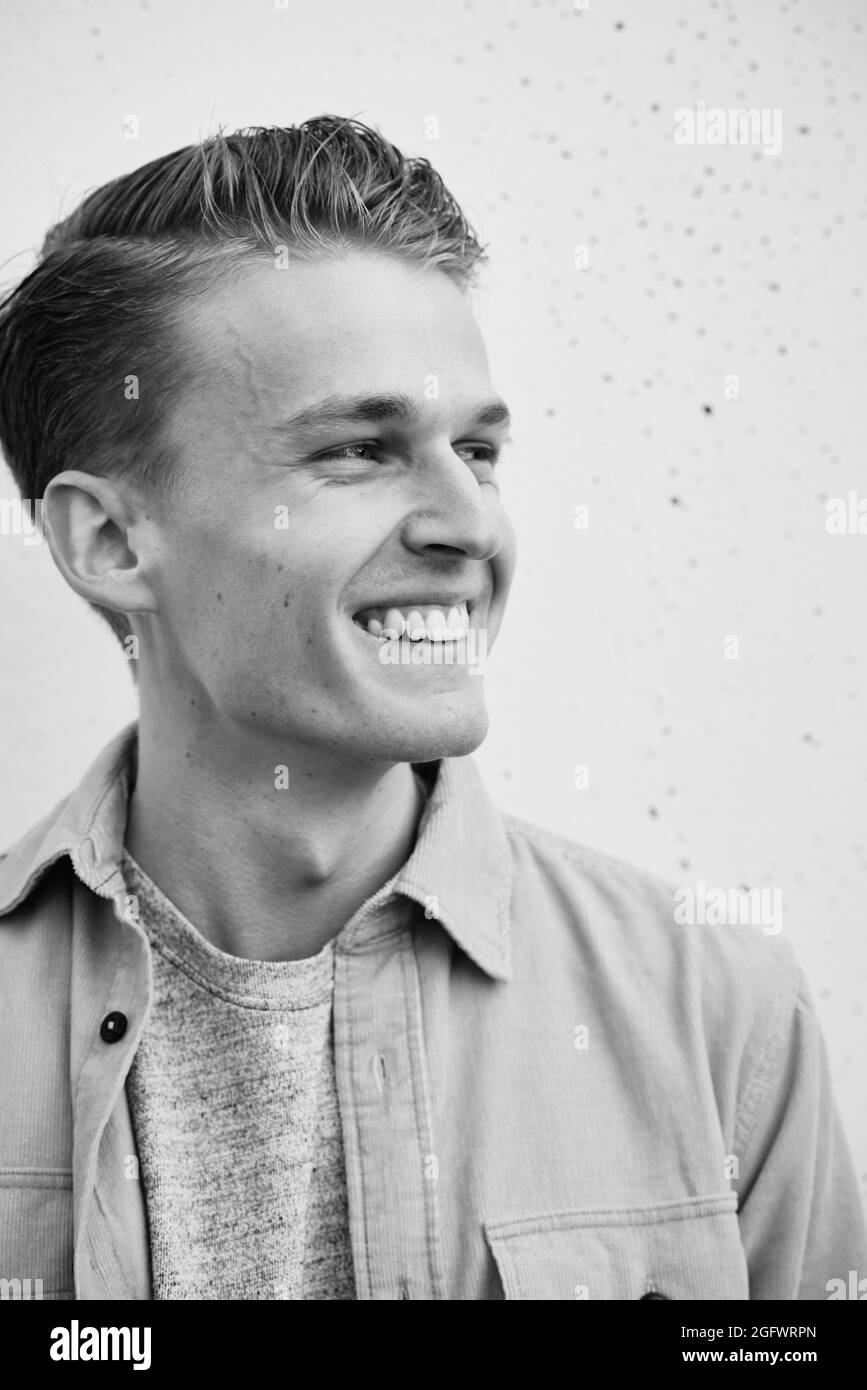 Attractive young smiling man Black and White Stock Photos & Images - Alamy