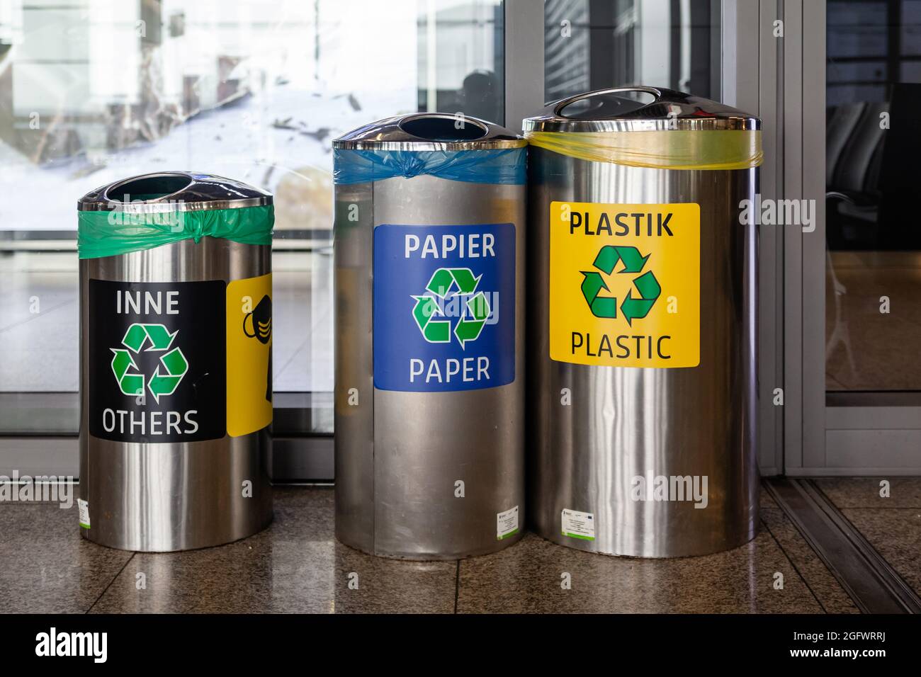 A set of wastebins for waste segregation seen in the main terminal ...