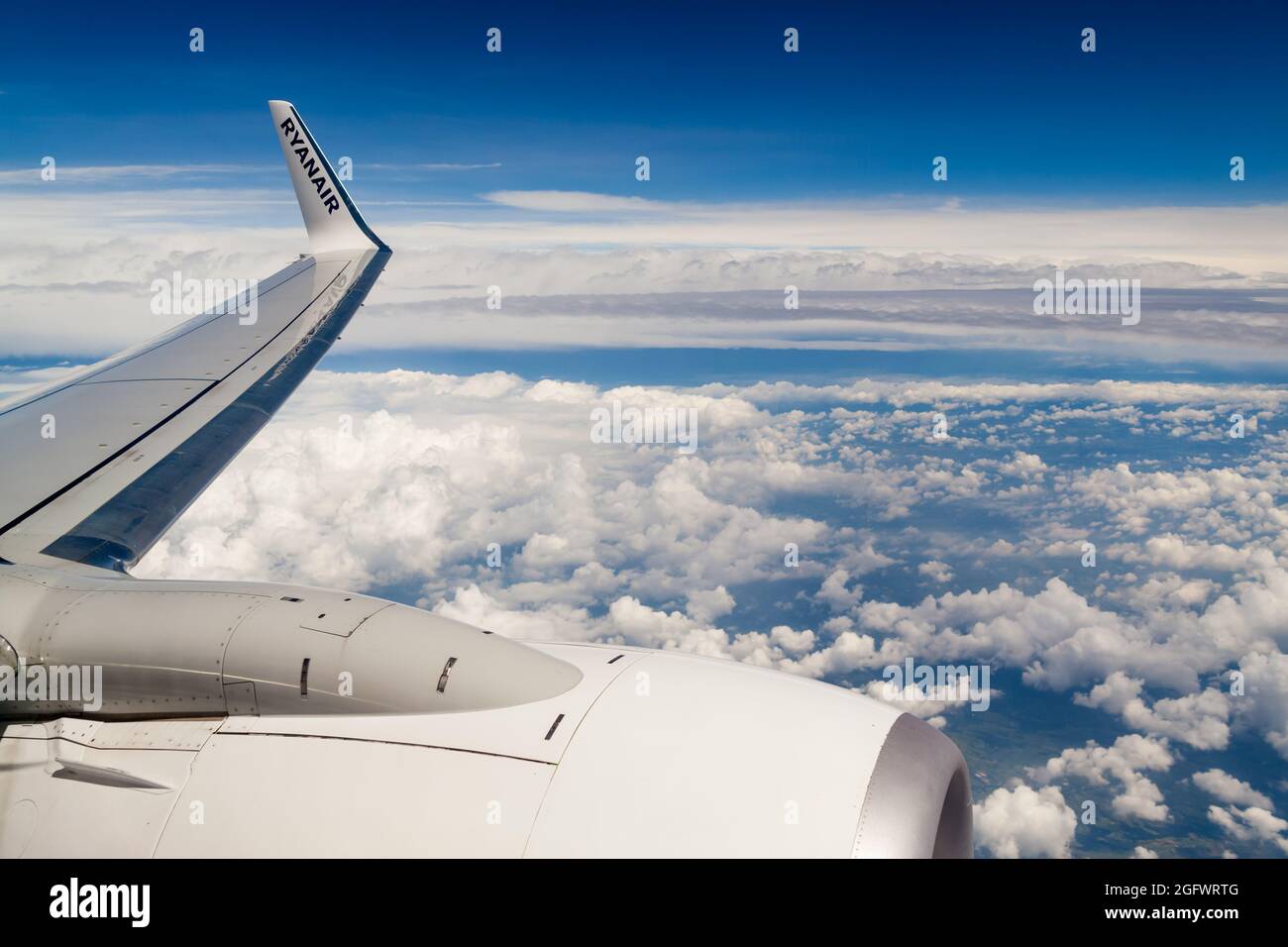 Ballast on the aeroplane wing seen through the window of Ryanair's ...