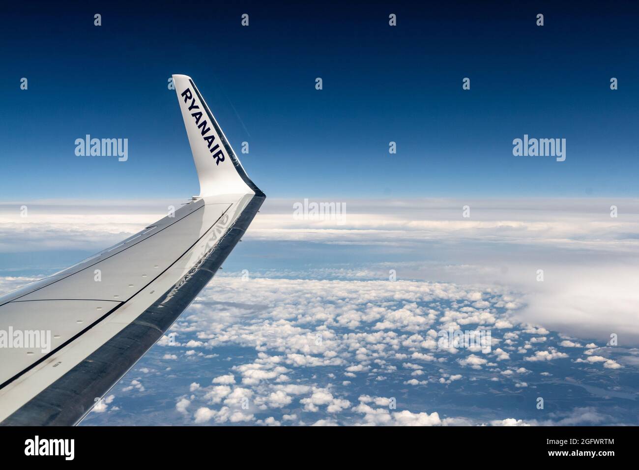Ballast on the aeroplane wing seen through the window of Ryanair's ...