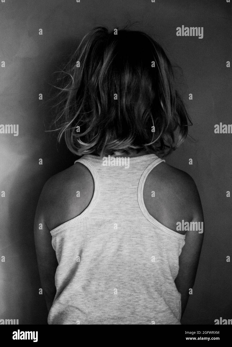 Rear view of child Stock Photo - Alamy