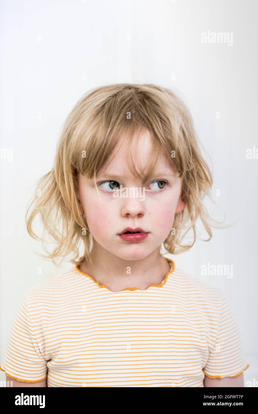 Portrait of sulking girl Stock Photo - Alamy