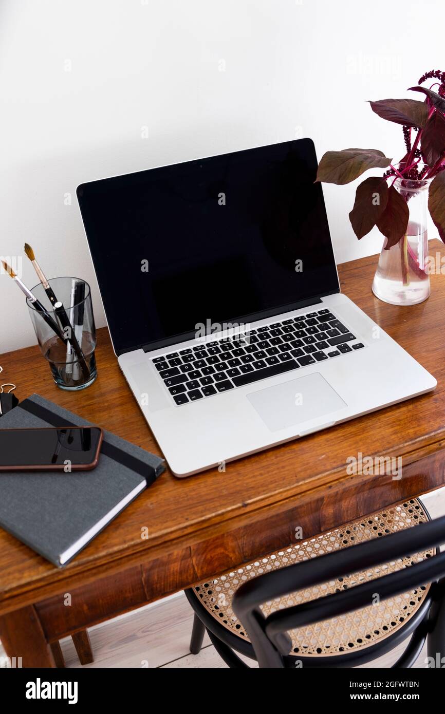 View of laptop on desk Stock Photo - Alamy