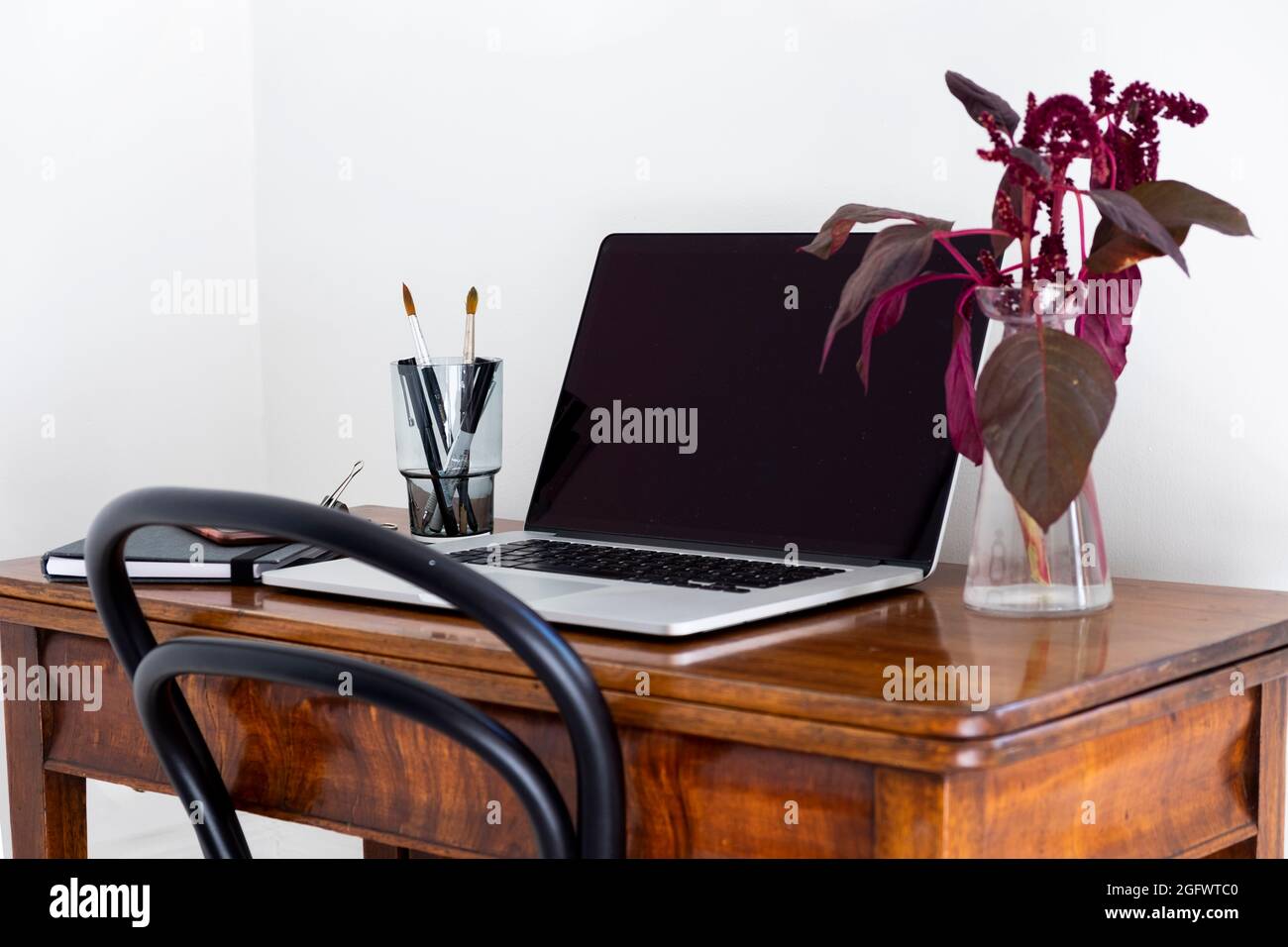 View of laptop on desk Stock Photo - Alamy
