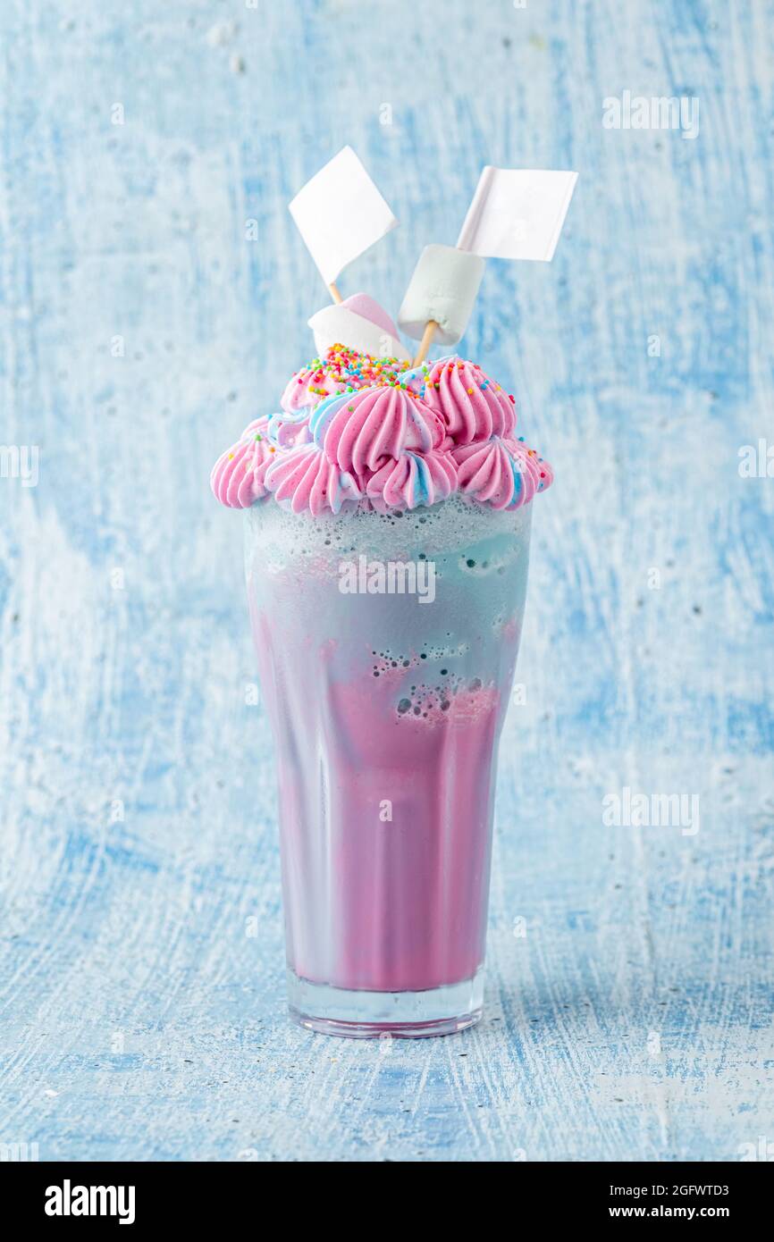 Glass pink milkshake decorated candy hi-res stock photography and ...
