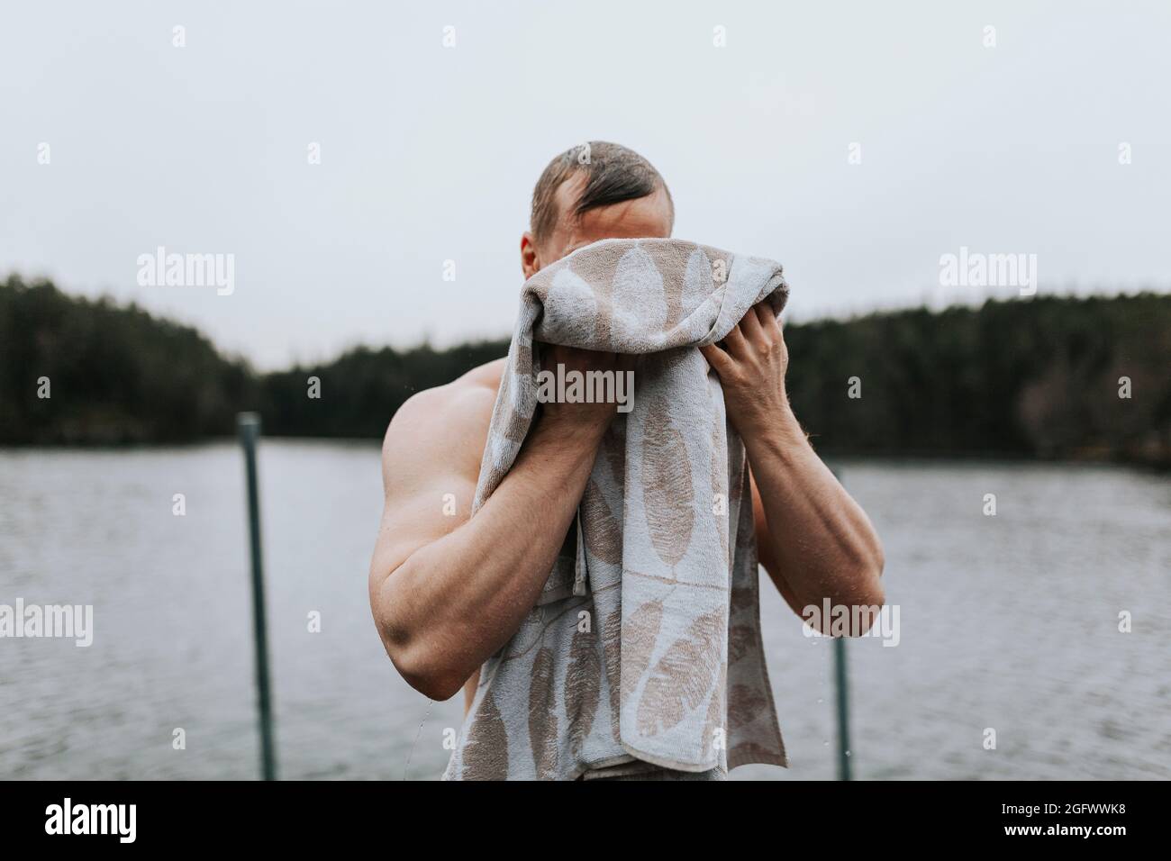 Drying himself towel hi-res stock photography and images - Alamy