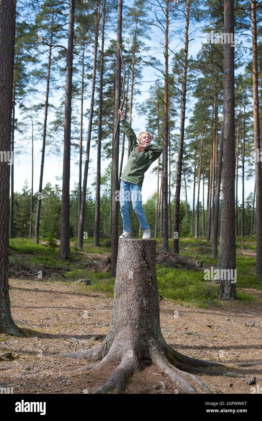 Teenage boy standing full length hi-res stock photography and images ...
