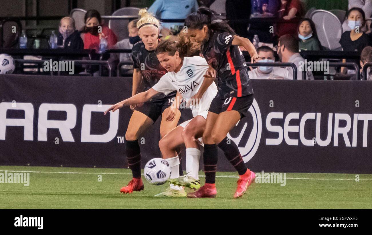 New York's Elizabeth Eddy gets trapped in the Portland double team of ...