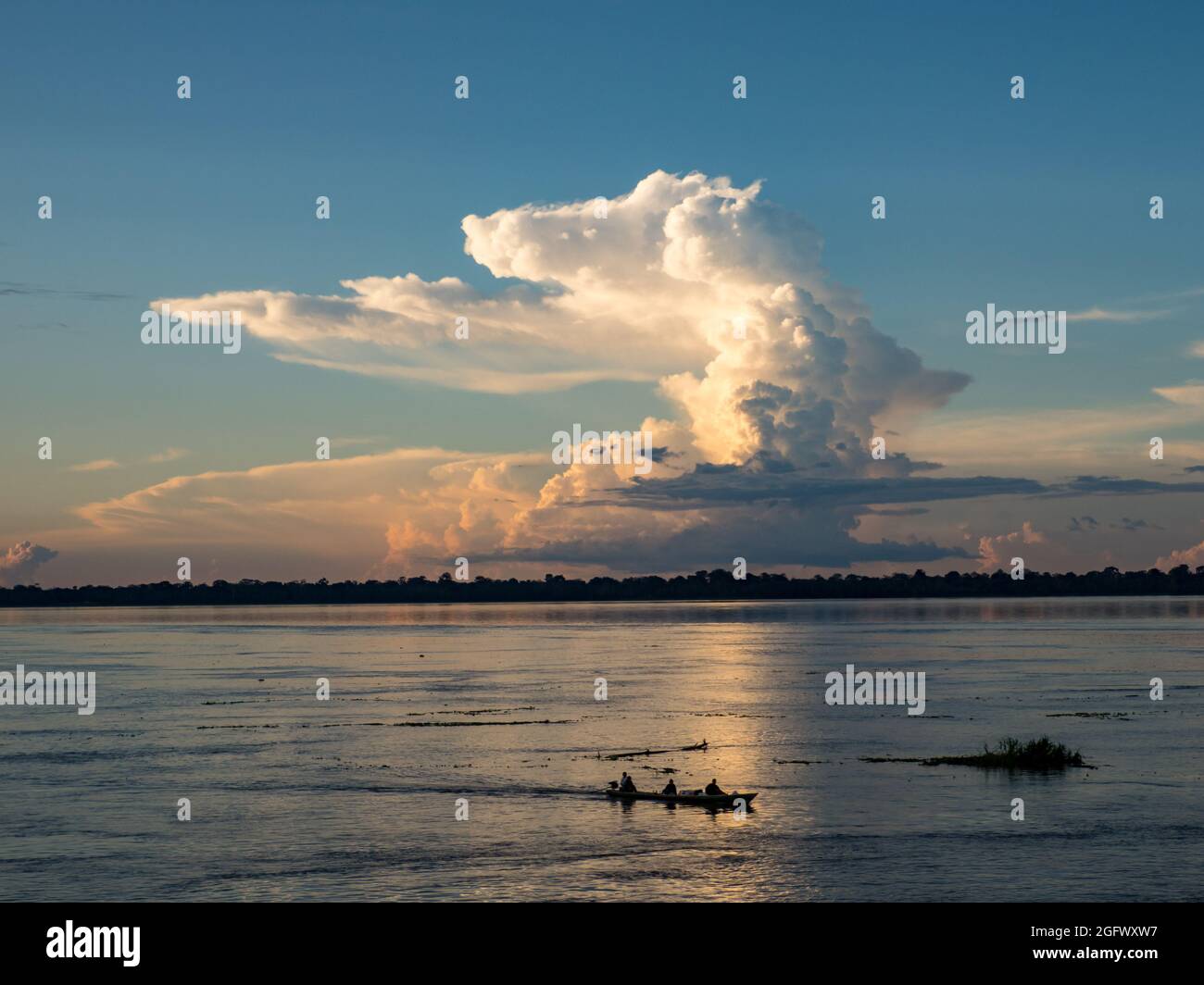 Magic sunset with beautiful clouds over the Amazon river. Amazonia ...