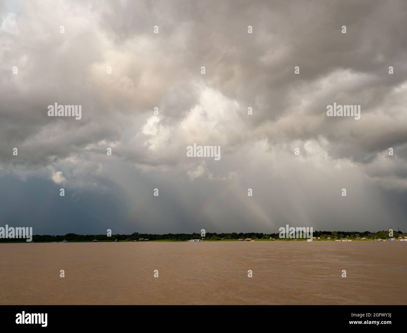 Storm clouds over the Amazon river in the rainforests - green lungs of ...