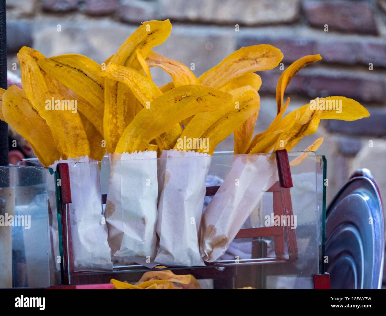 Fried plantains sold in bags on the streets of Bogota, traditional ...