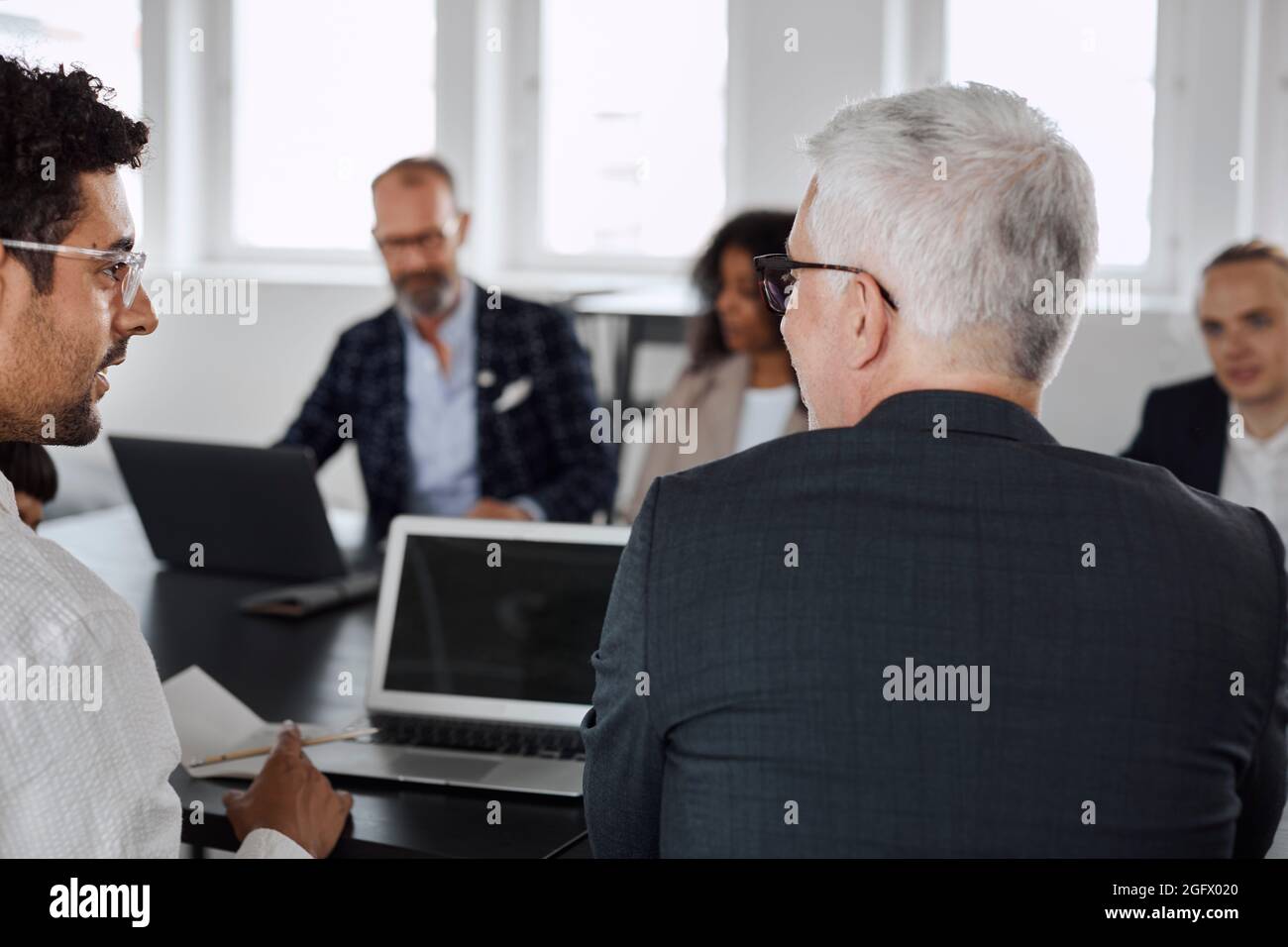 Men talking business meeting hi-res stock photography and images - Alamy
