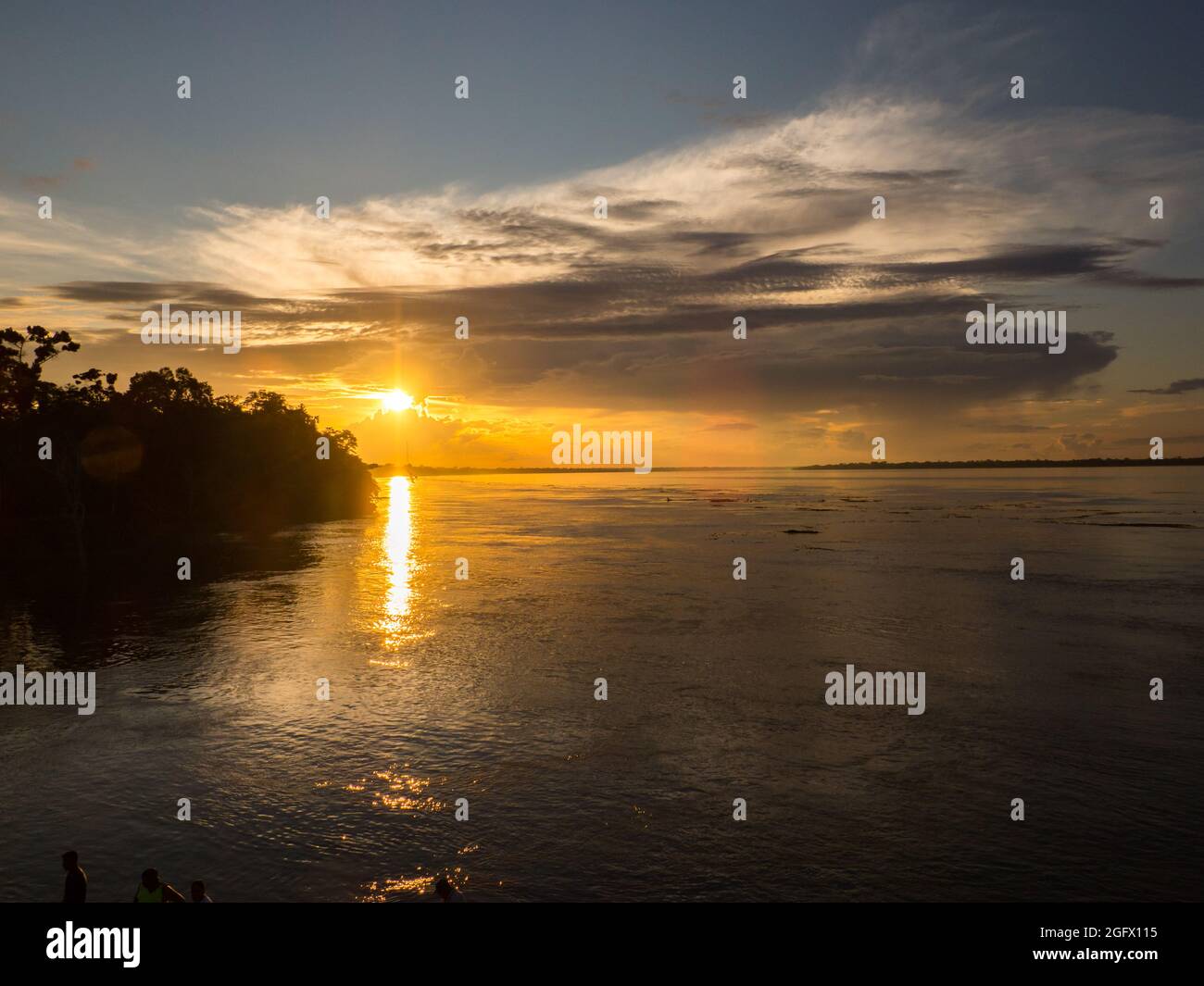 Magic sunset with beautiful clouds over the Amazon river. Amazonia ...