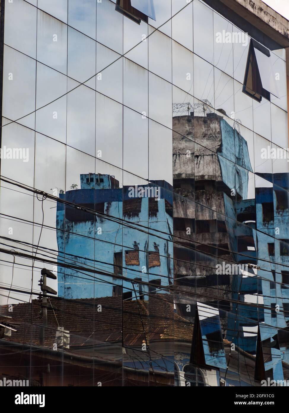 Iquitos, Peru - Dec,2019: The abandoned, unfinished, blue building is ...