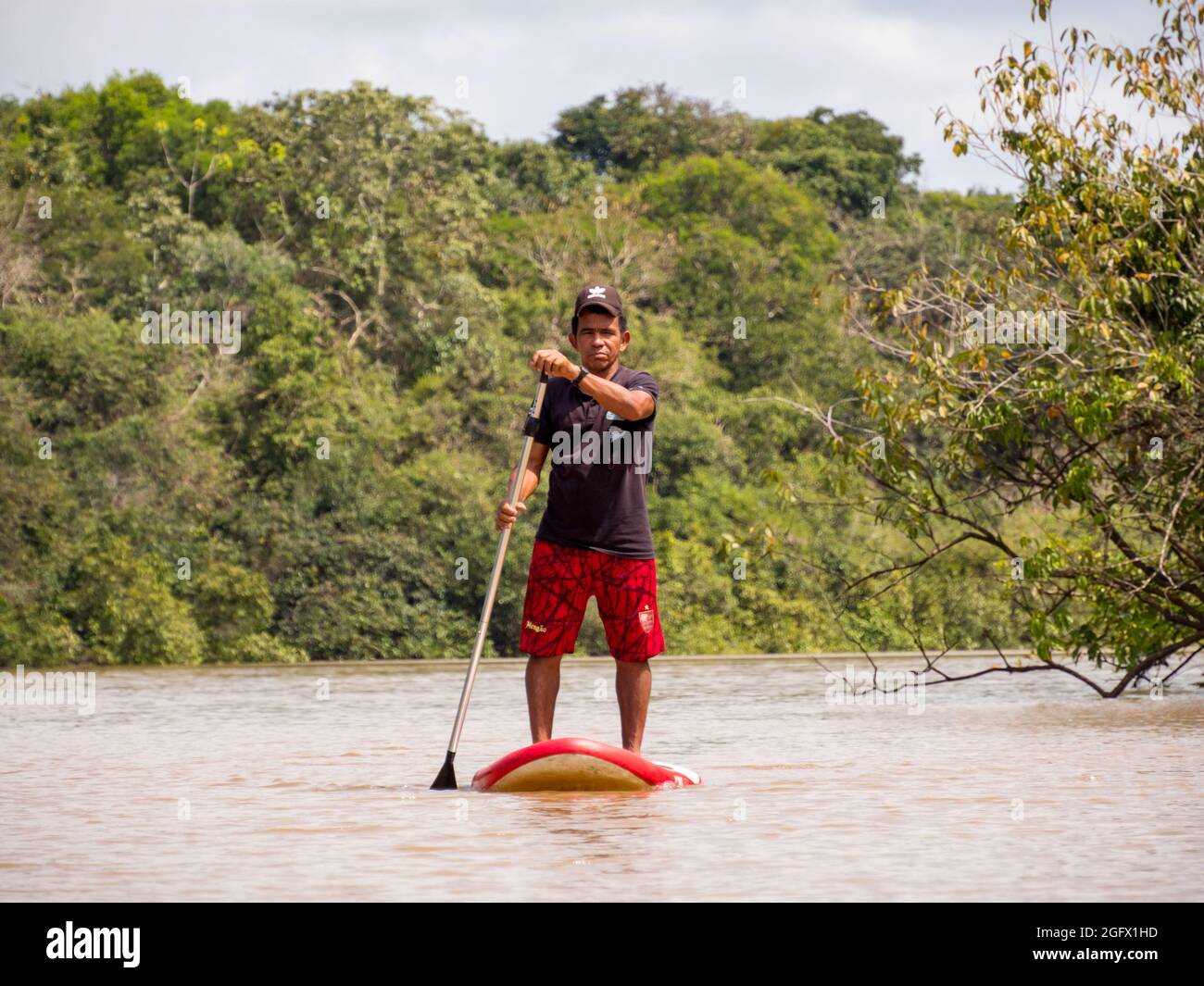 Laguna Onza, Brazil - Dec 2019: Portrait of a man floating on water on ...