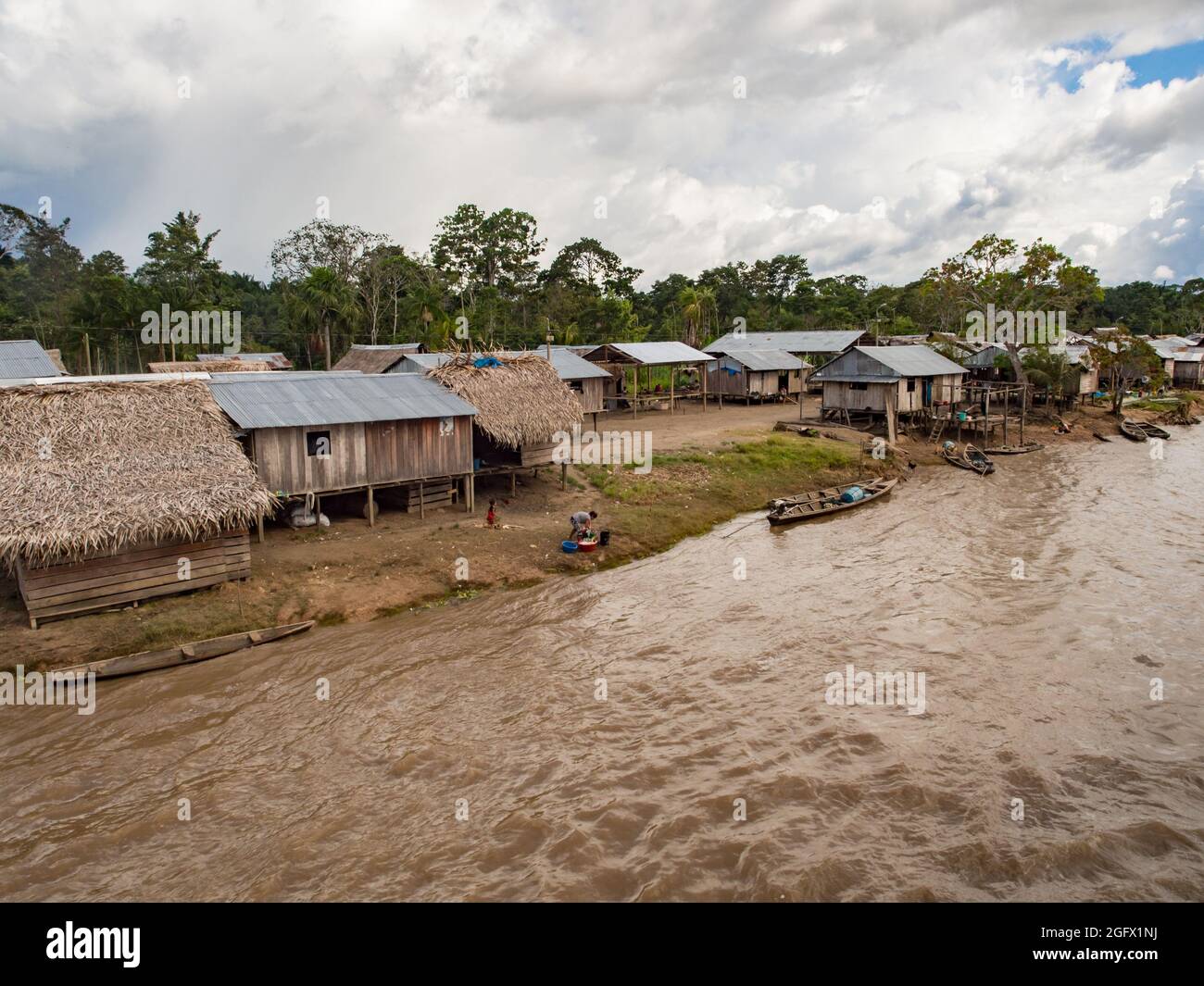 Amazon River, Peru - May, 2016: Small village on the bank of the Amazon ...
