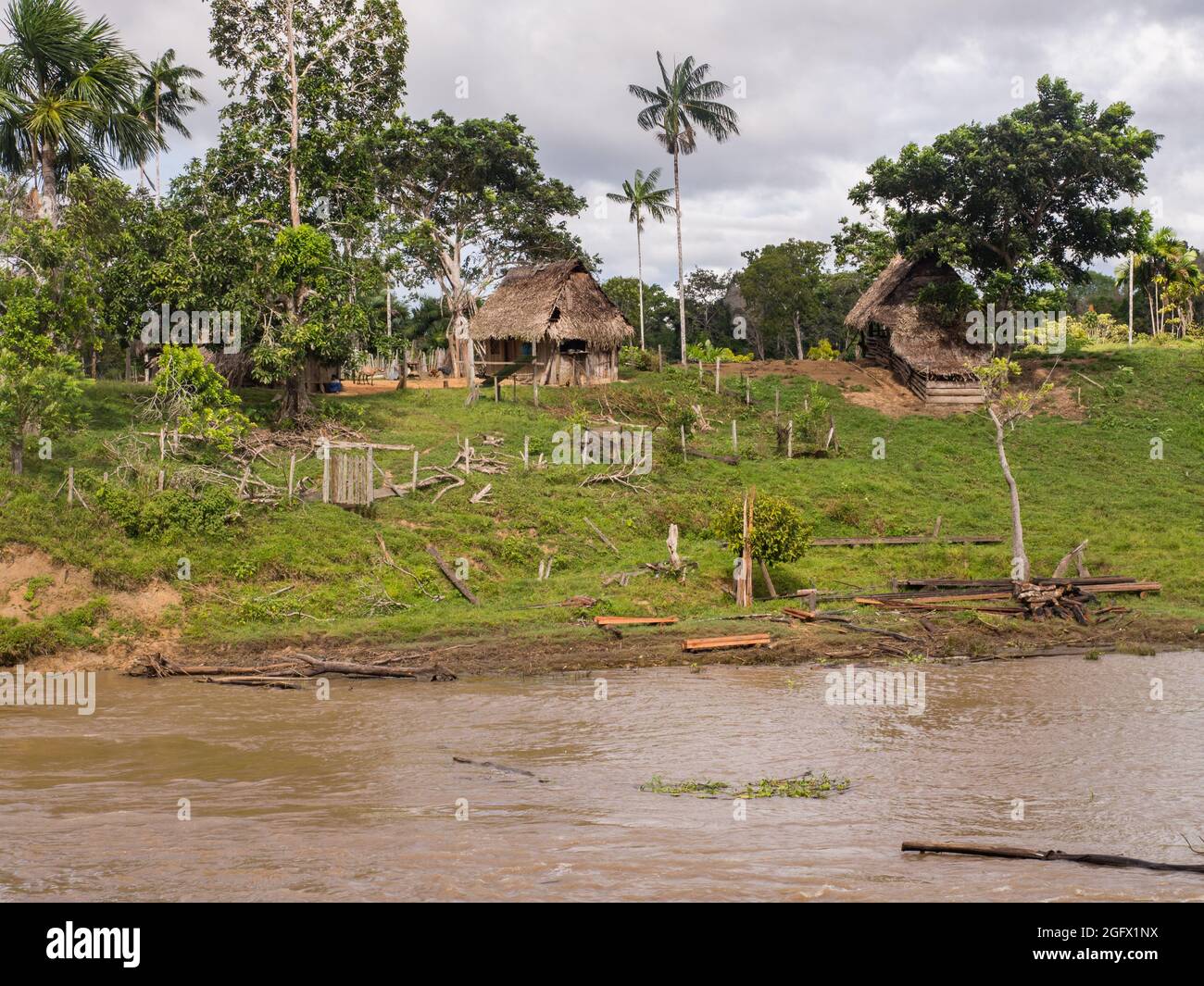 Amazon River, Peru - May, 2016: Small village on the bank of the Amazon ...