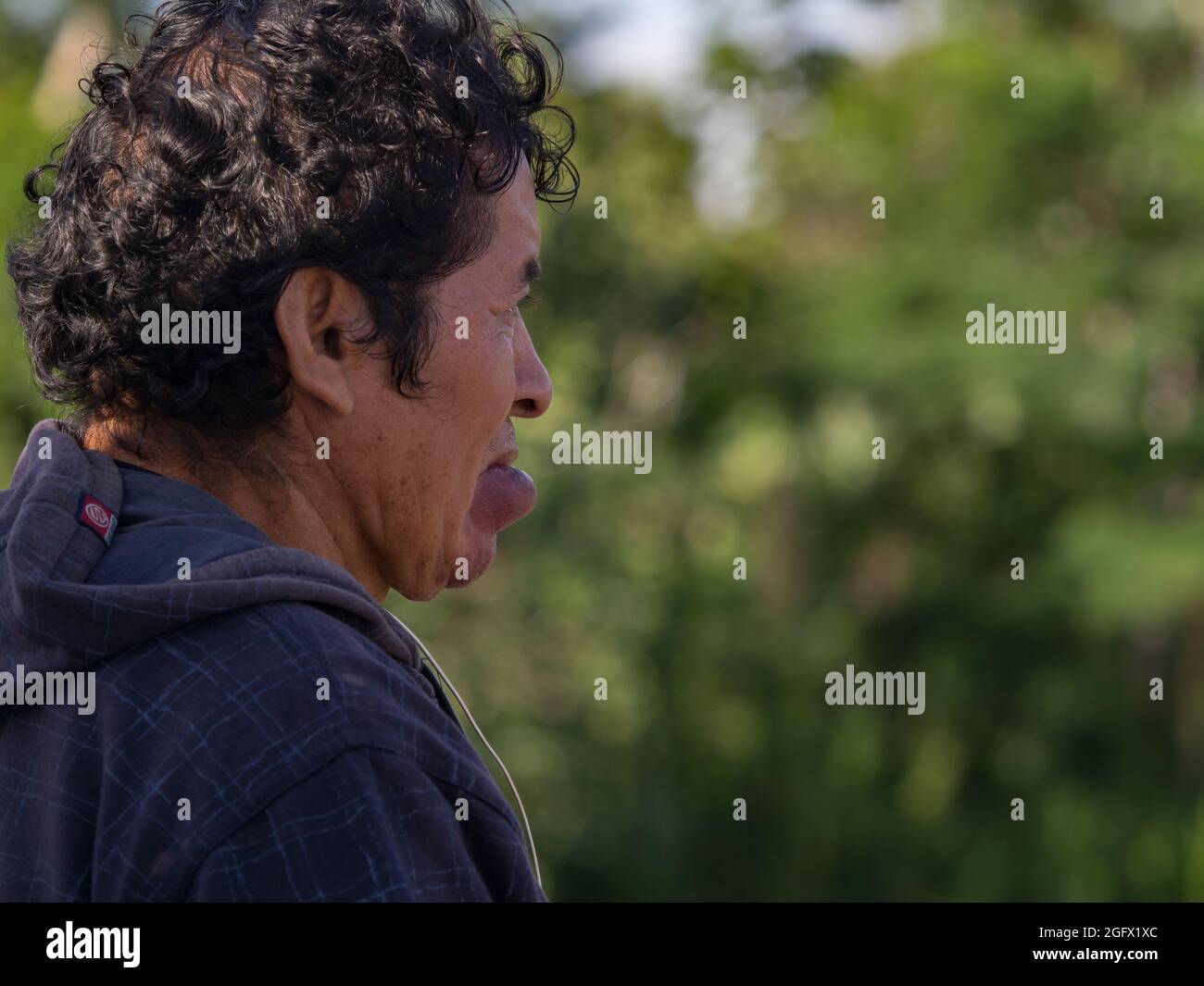 Jungle, Brazil - Dec, 2017: Portrait of a man with a red skin in the ...