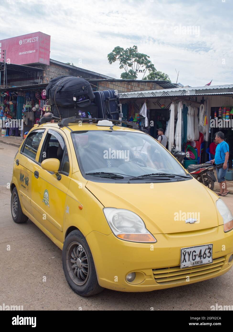Tabatinga, Amazonas, Brazil, Dec , 2017: Yellow taxi in the port on the ...