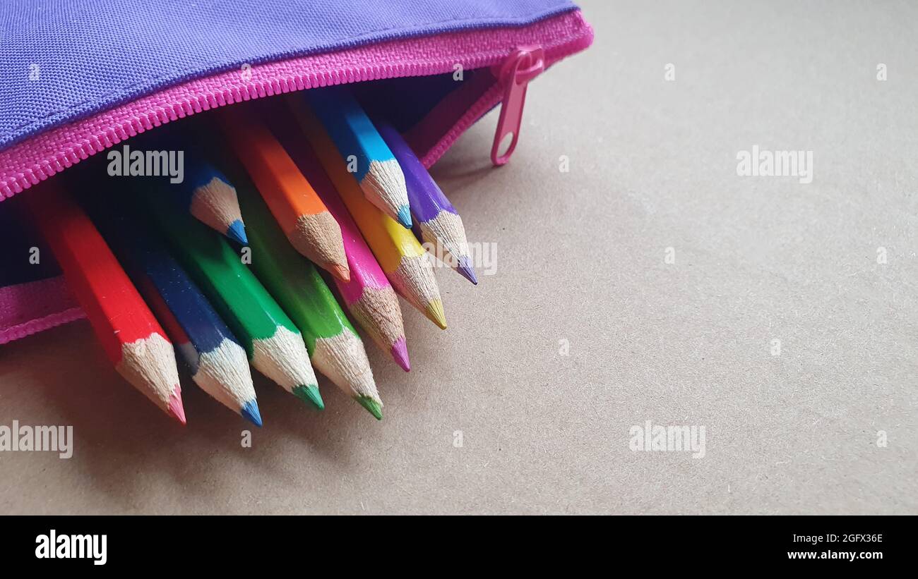 Coloured crayons on neutral background Stock Photo - Alamy
