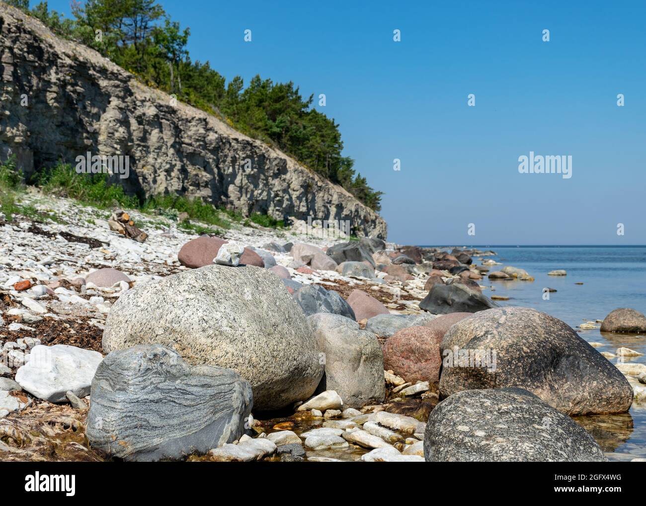sunny summer landscape with dolomite rocks by the sea, beautiful view ...