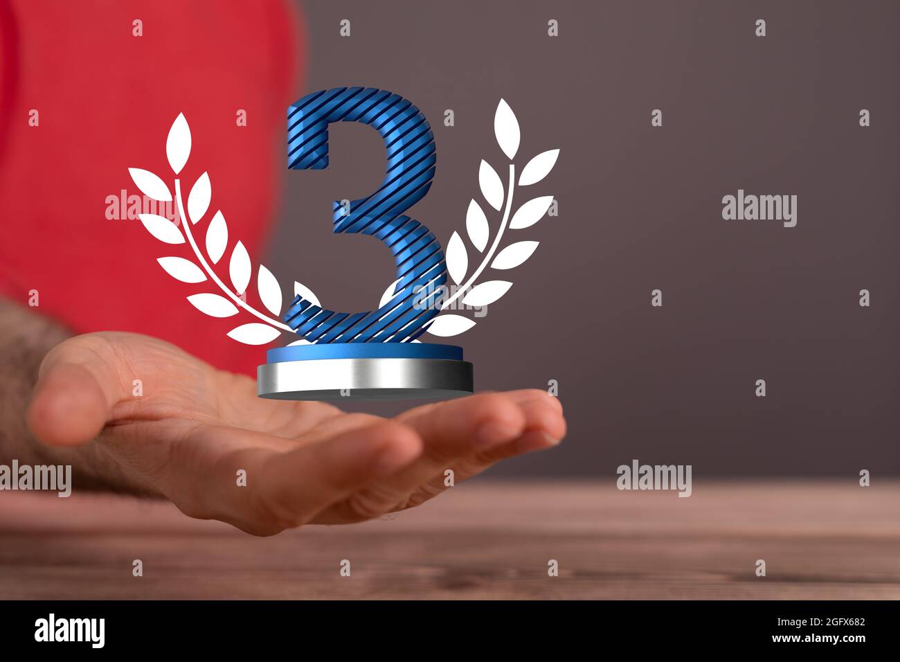 3rd place letter in 3d in hand Stock Photo - Alamy
