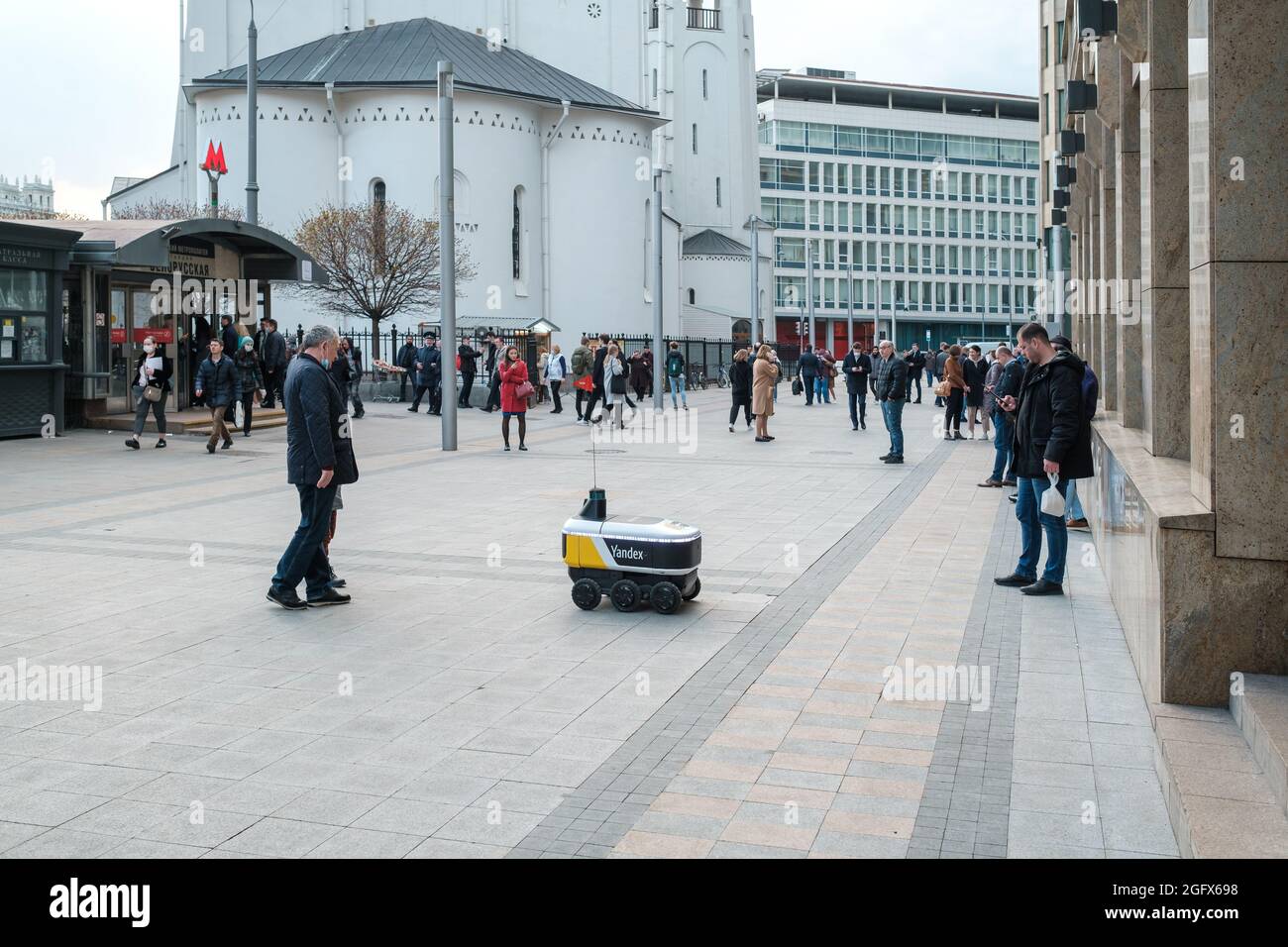 Delivery rover on busy street Stock Photo - Alamy