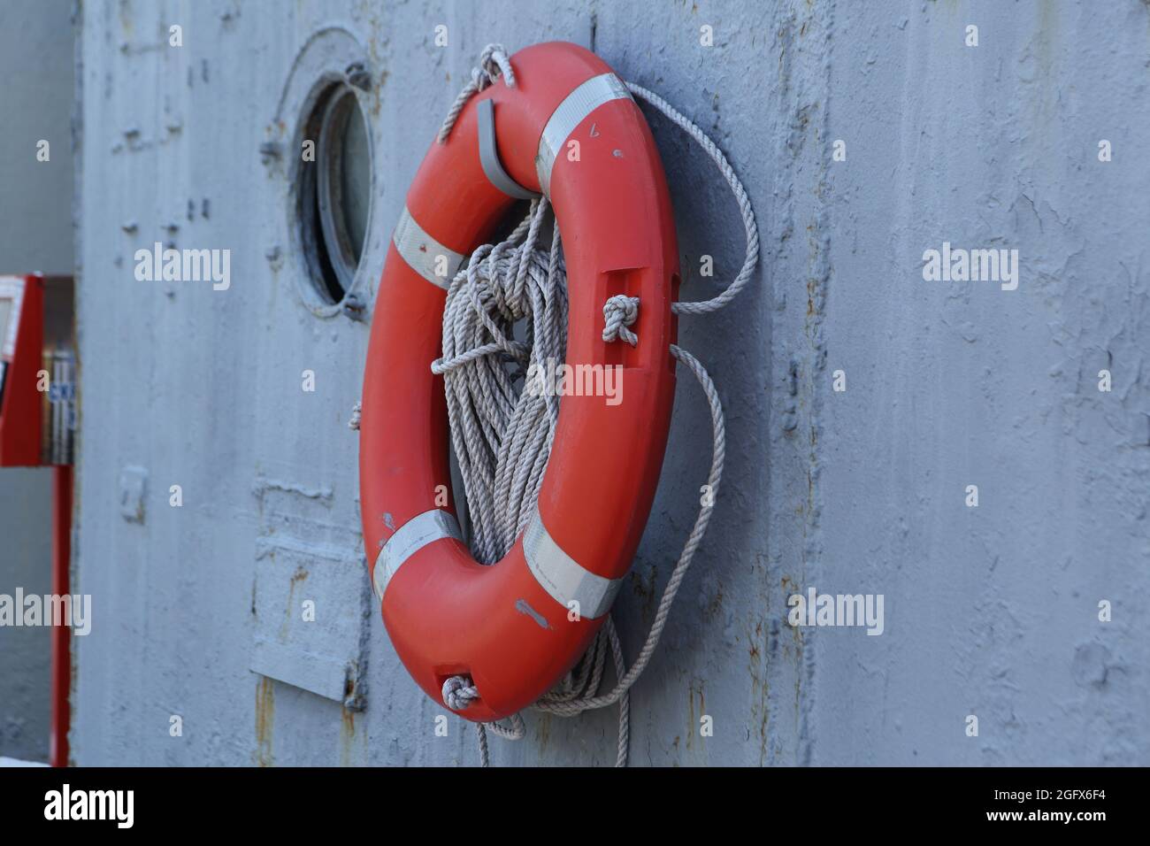 Lifebuoy or life preserver hanging on rescue booth Stock Photo - Alamy