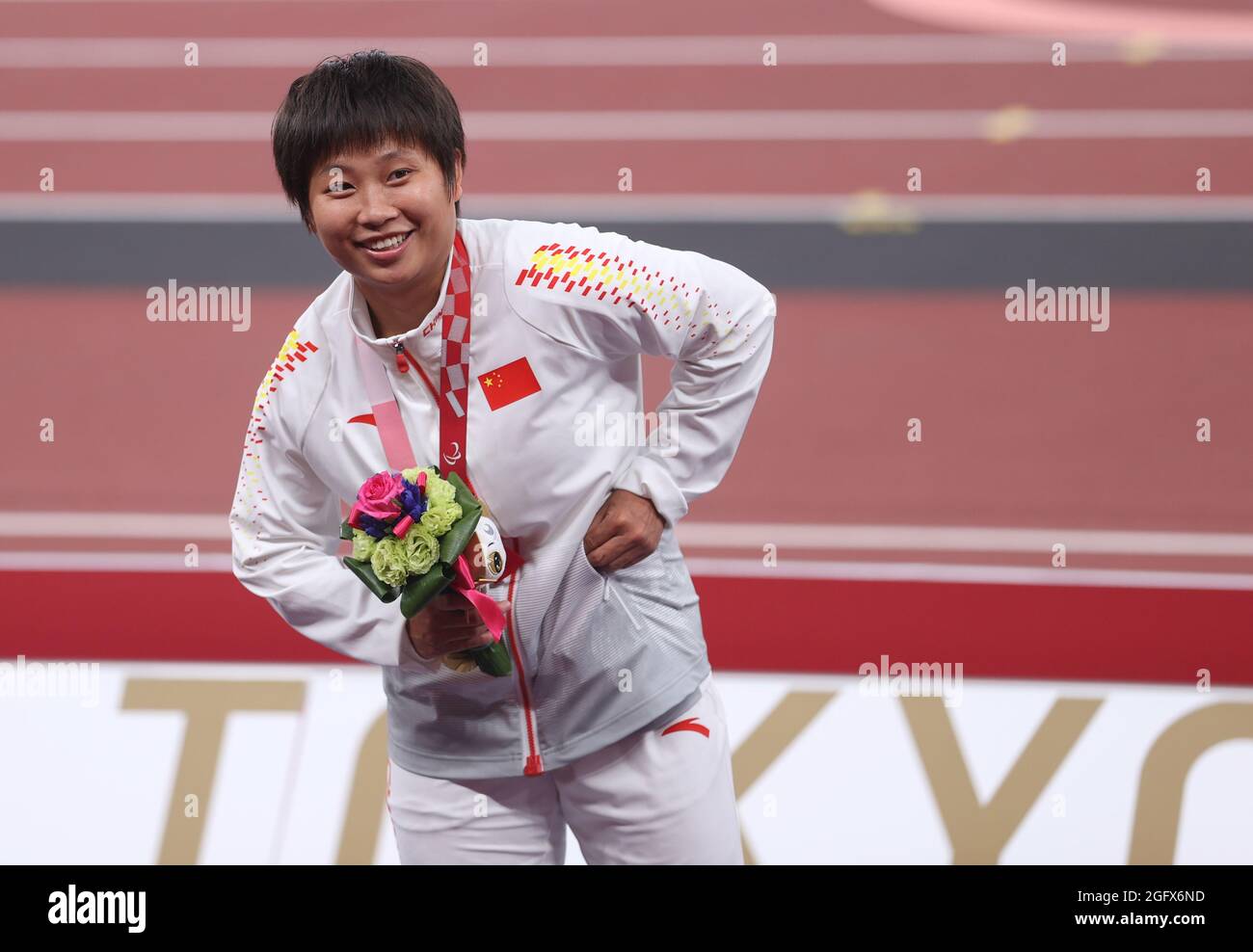 Tokyo, Japan. 27th Aug, 2021. Zhou Xia of China reacts during the medal ...