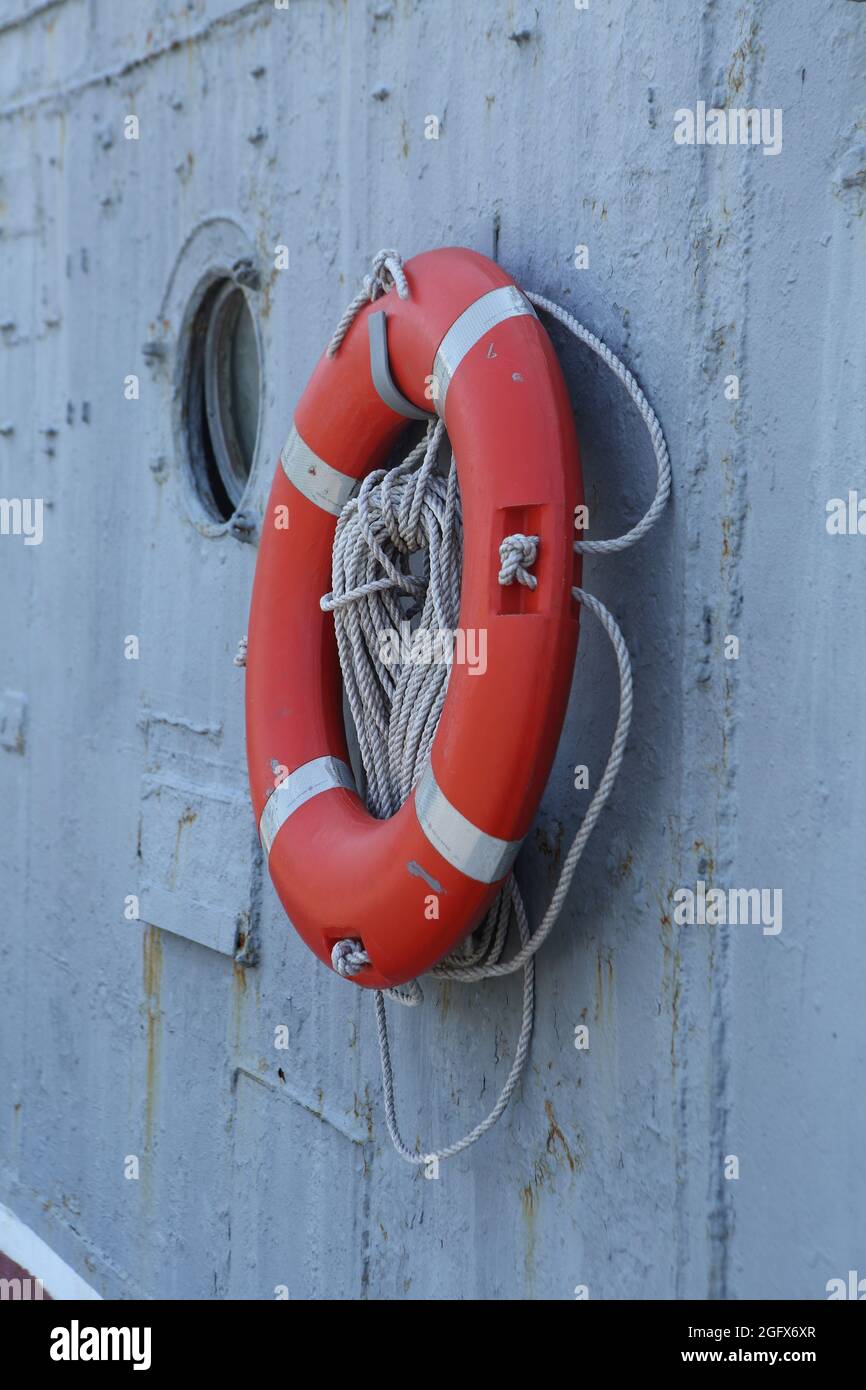 Lifebuoy or life preserver hanging on rescue booth Stock Photo - Alamy