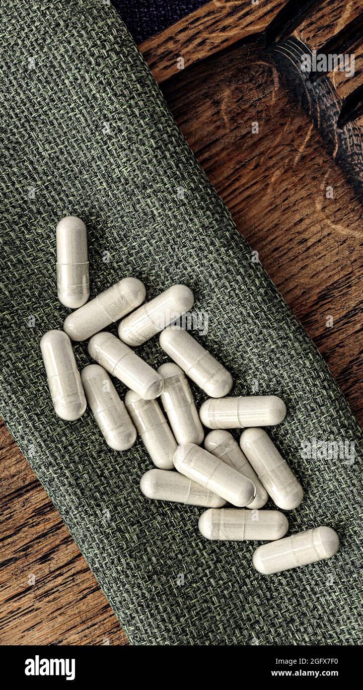 n-acetyl cysteine (NAC) supplement capsules on burlap rag. immune ...