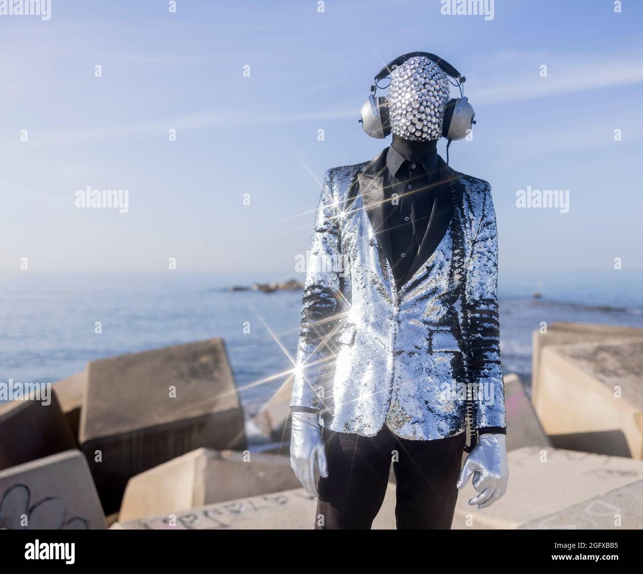 Mr disco man with sparkly face and headphones Stock Photo - Alamy